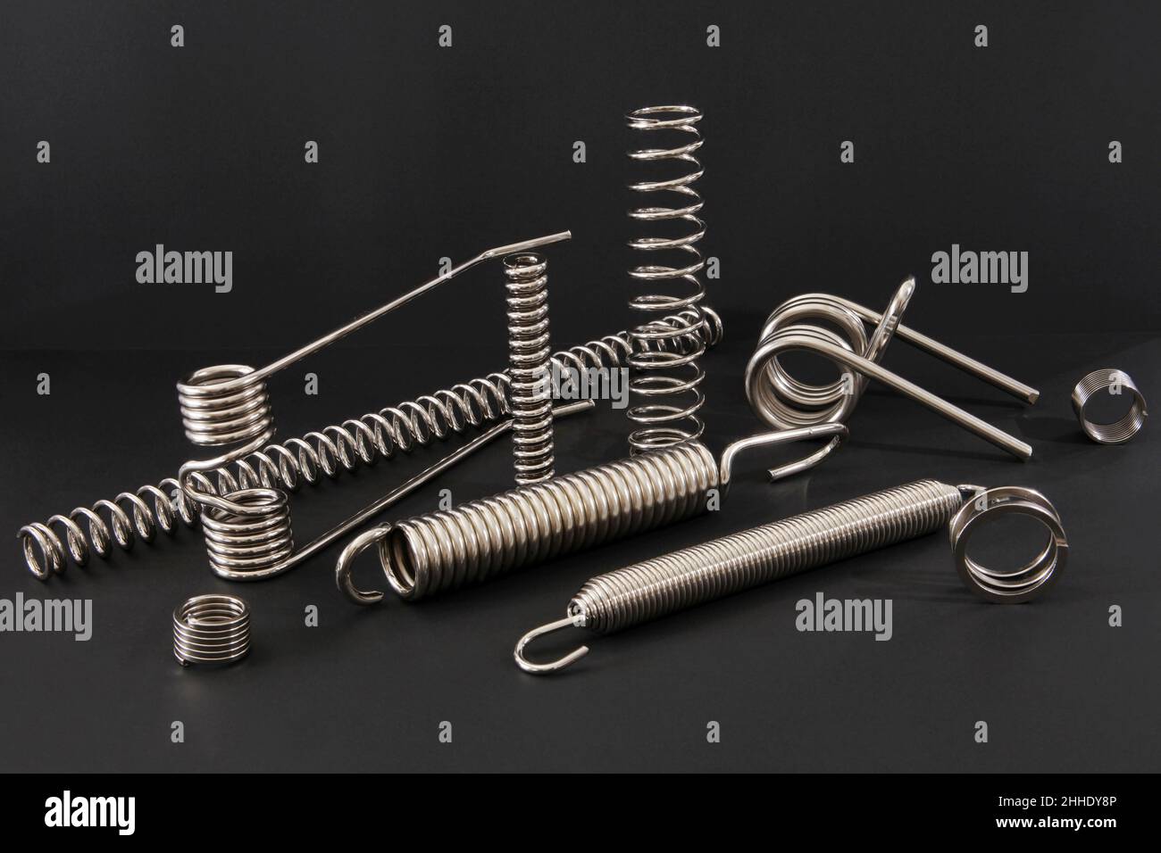 Metal springs in different sizes Stock Photo - Alamy