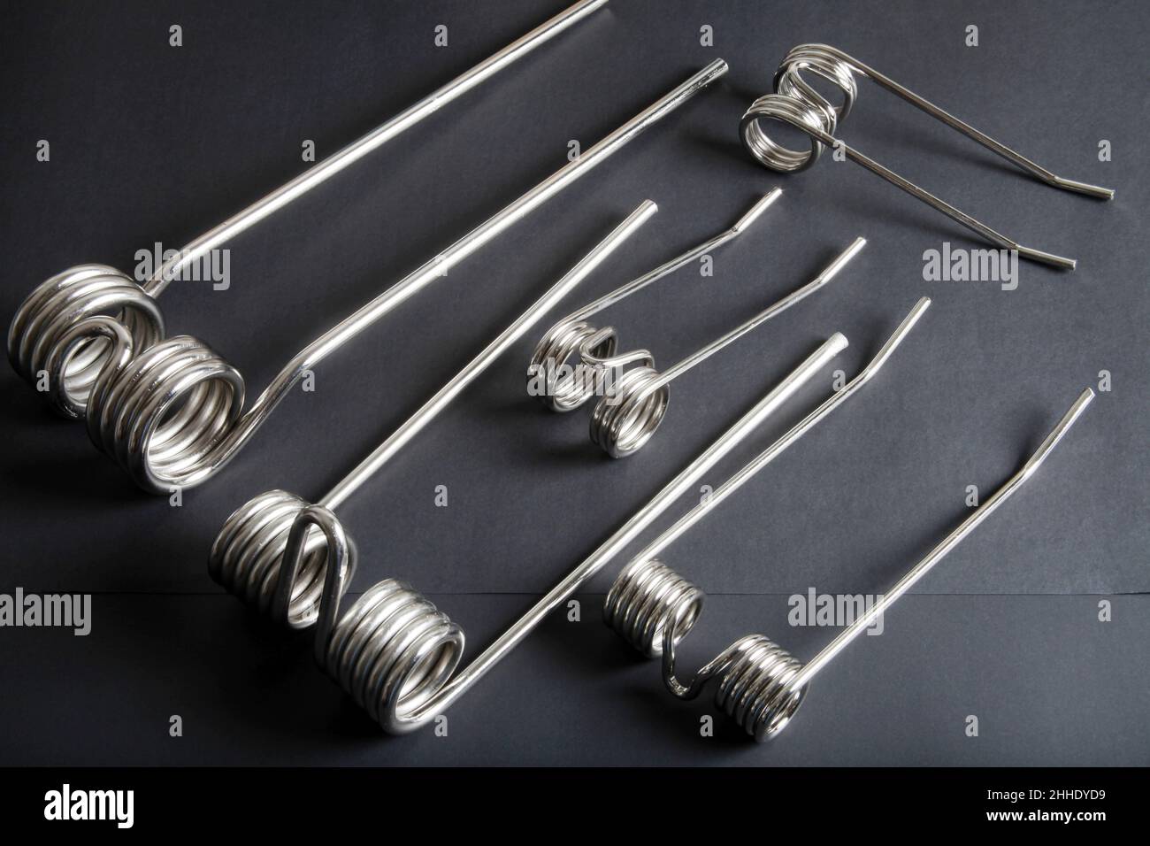 Metal springs in different sizes Stock Photo - Alamy