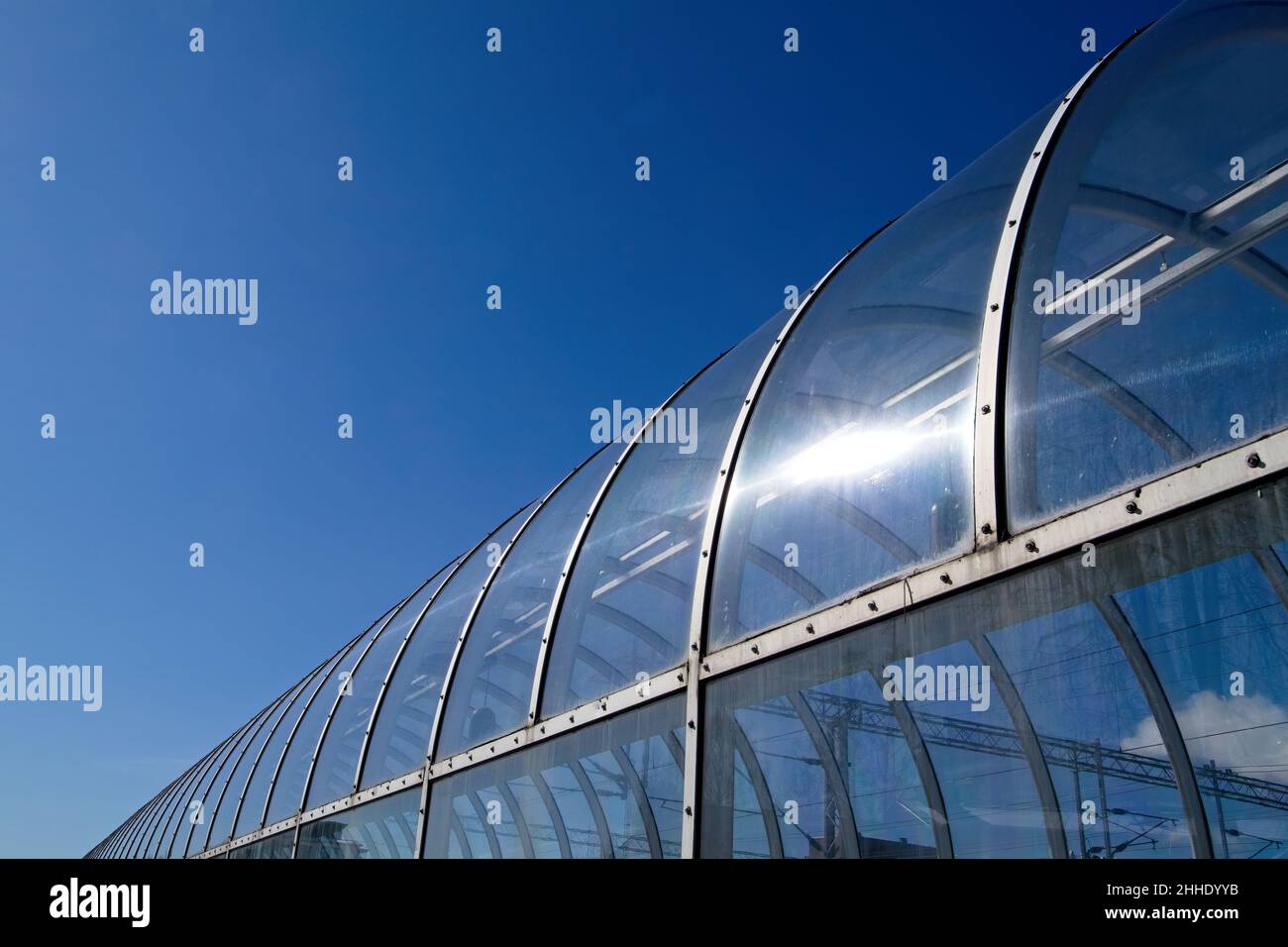 Glass roof of pathway to the trainway underpass Stock Photo - Alamy