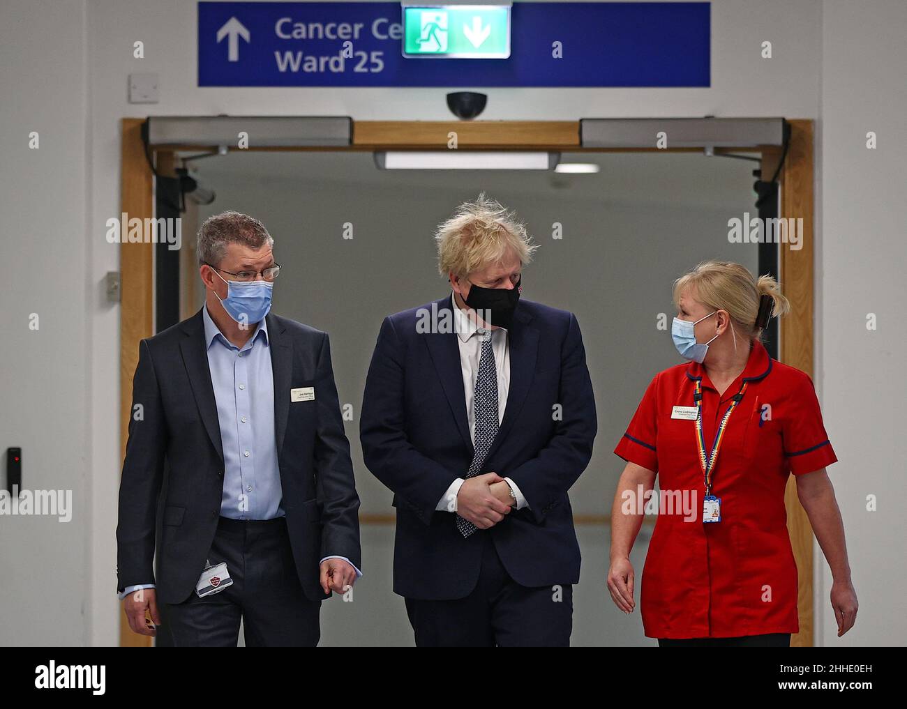 Prime Minister Boris Johnson walks with Chief Executive Professor Joe ...