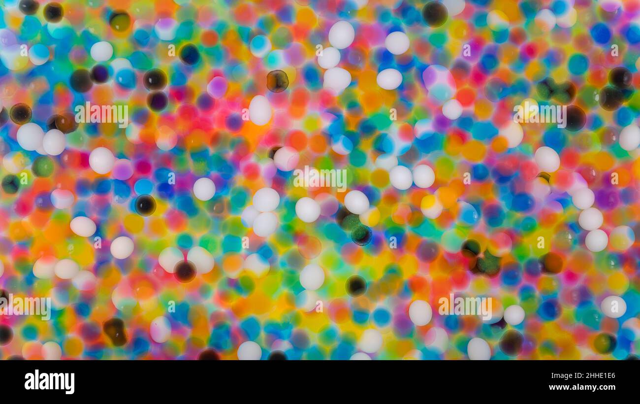 Water beads close-up, abstract background. Texture of Hydrogel balls or ...