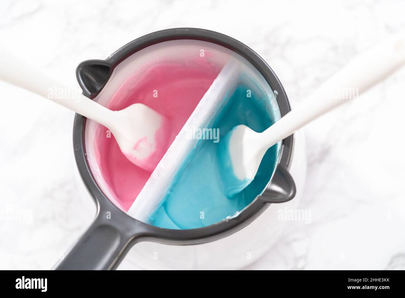 Melting chocolate melts in a candy melting pot to prepare mermaid tails ...