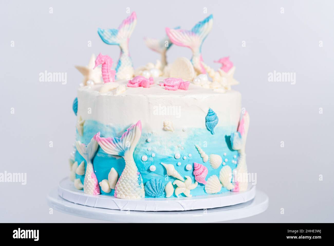 Mermaid-themed 3 layer vanilla cake decorated with chocolate mermaid ...