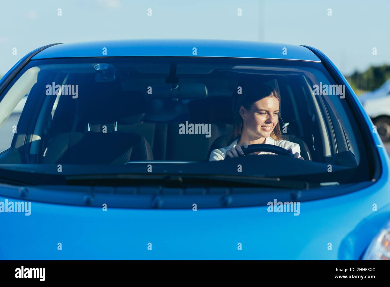 portrait of a successful and happy woman driving a car, photo from the ...