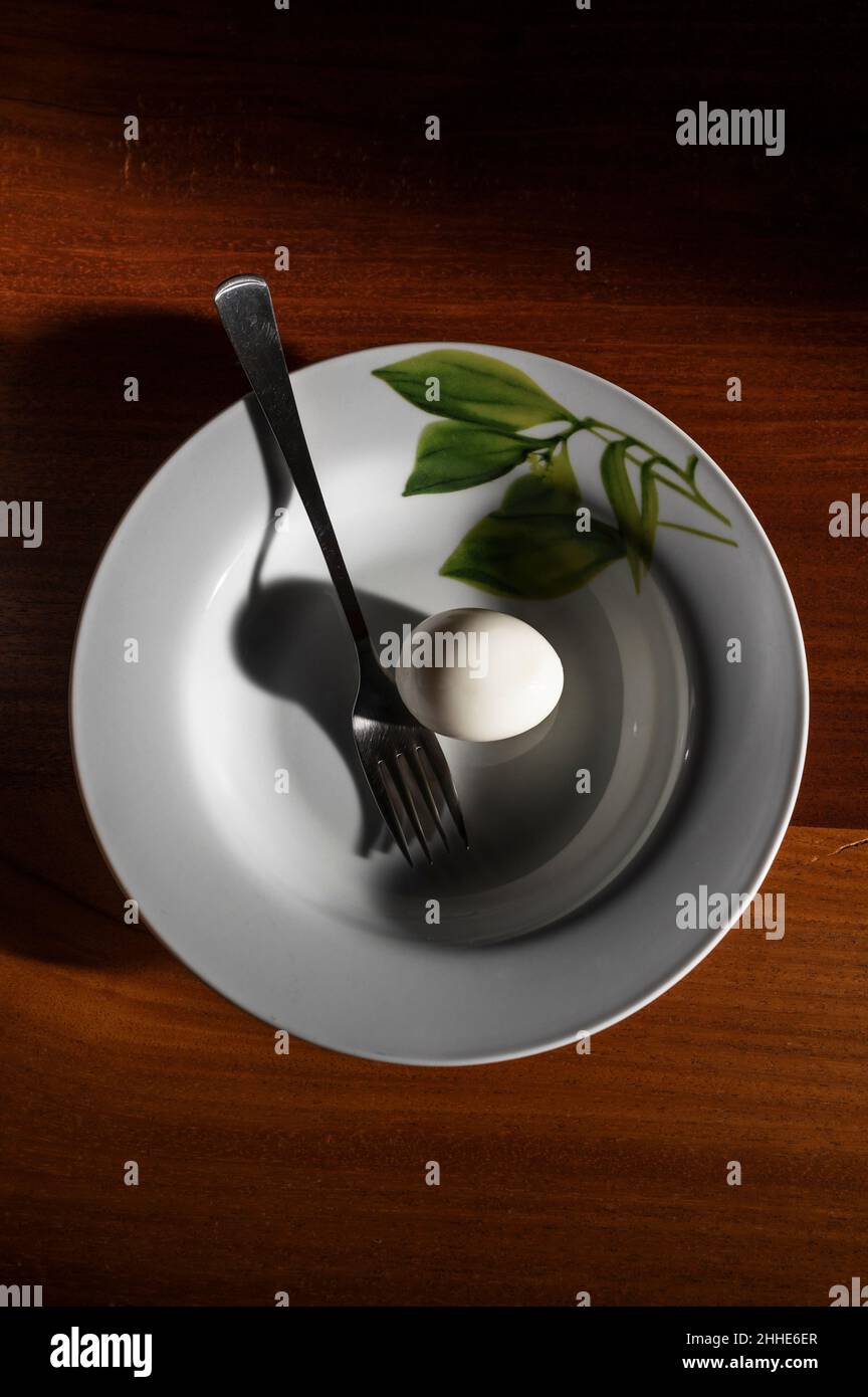 Boiled edd in the plate Stock Photo - Alamy
