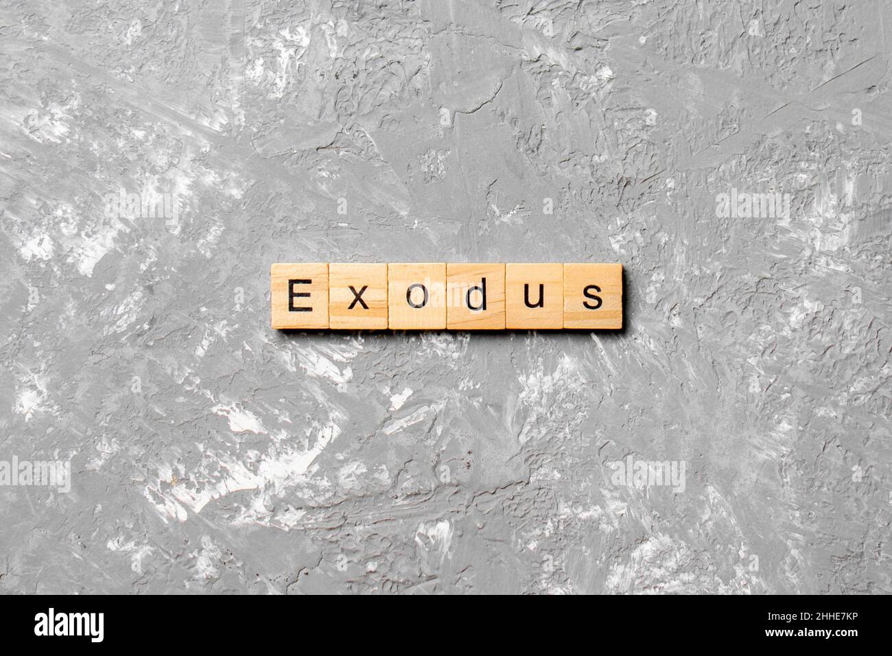 exodus word written on wood block. exodus text on table, concept Stock ...