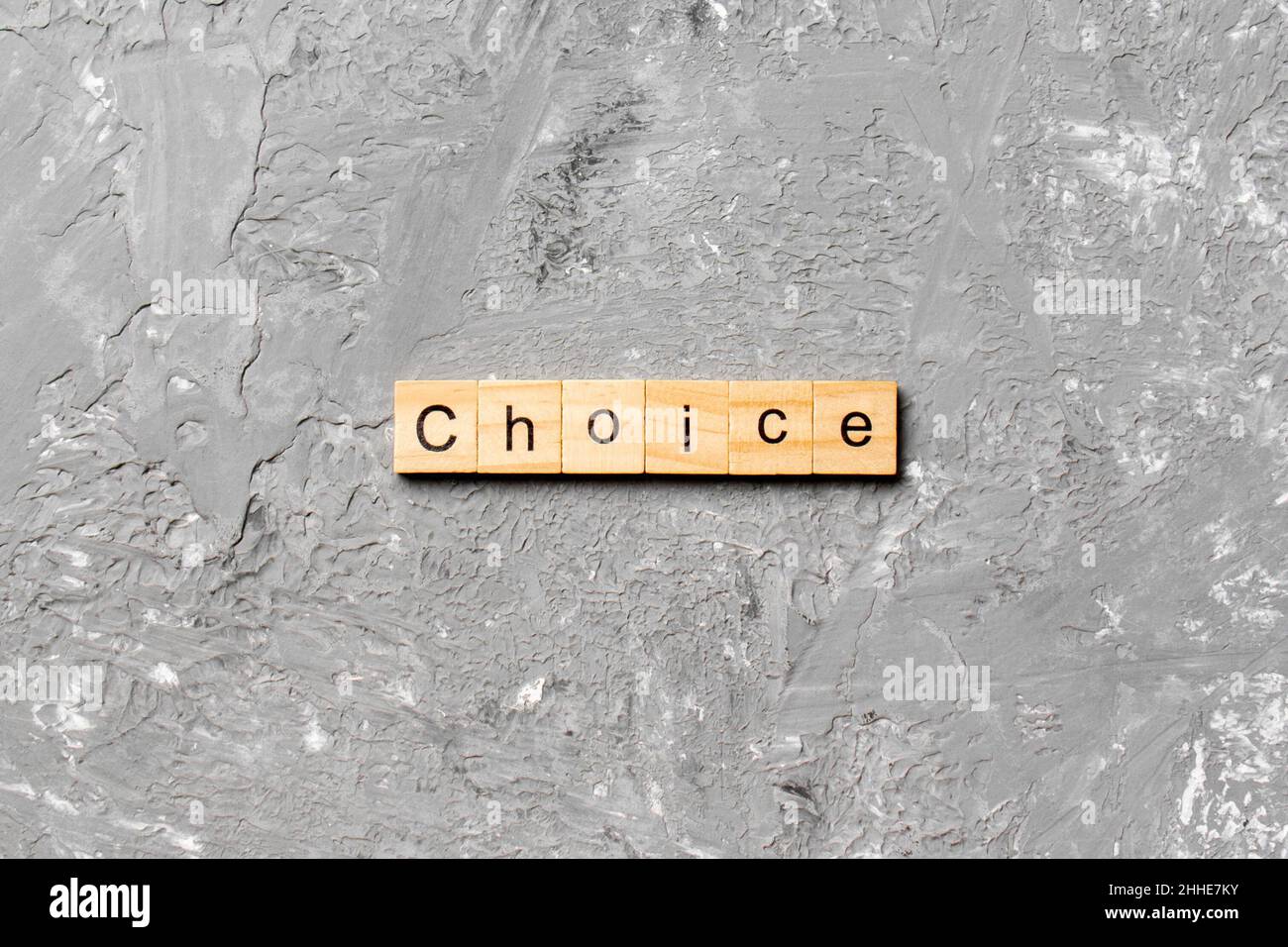 CHOICE word written on wood block. CHOICE text on cement table for your ...