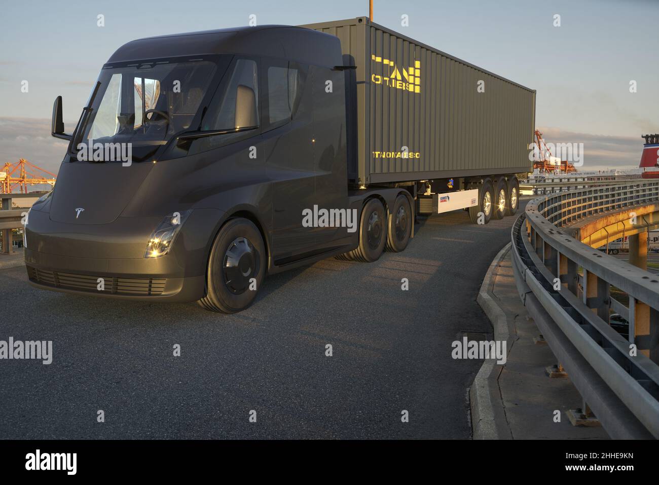 An electric Tesla Semi with a container at work in a seaport Stock ...