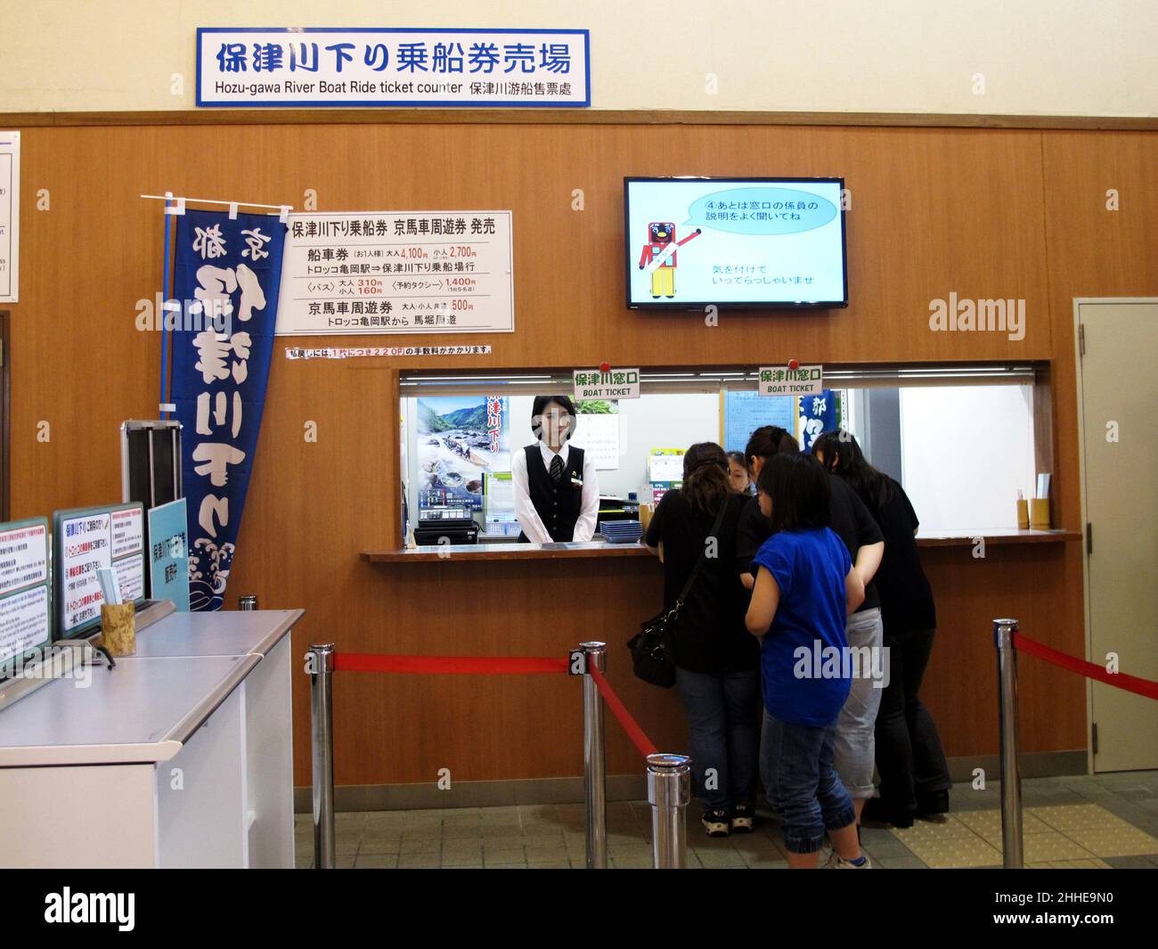 Japanese people and foreign travelers passenger wait and stand in queue ...