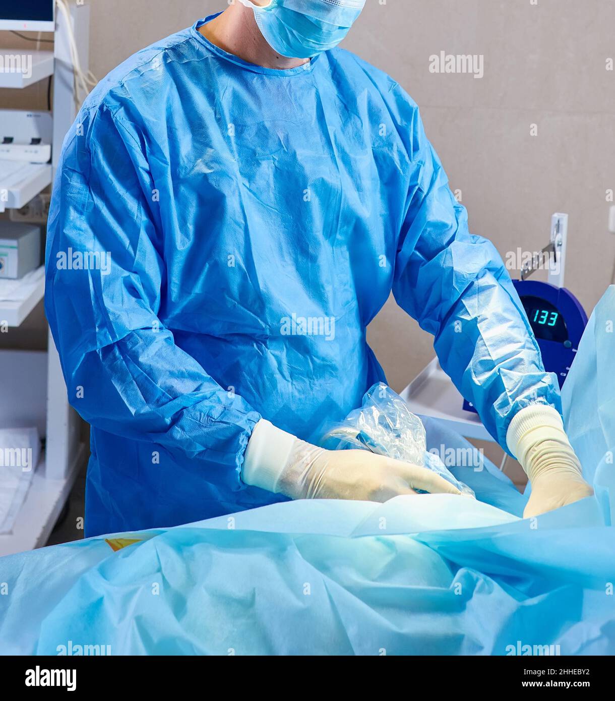 In the Hospital Operating Room Diverse Team of Professional Surgeons ...