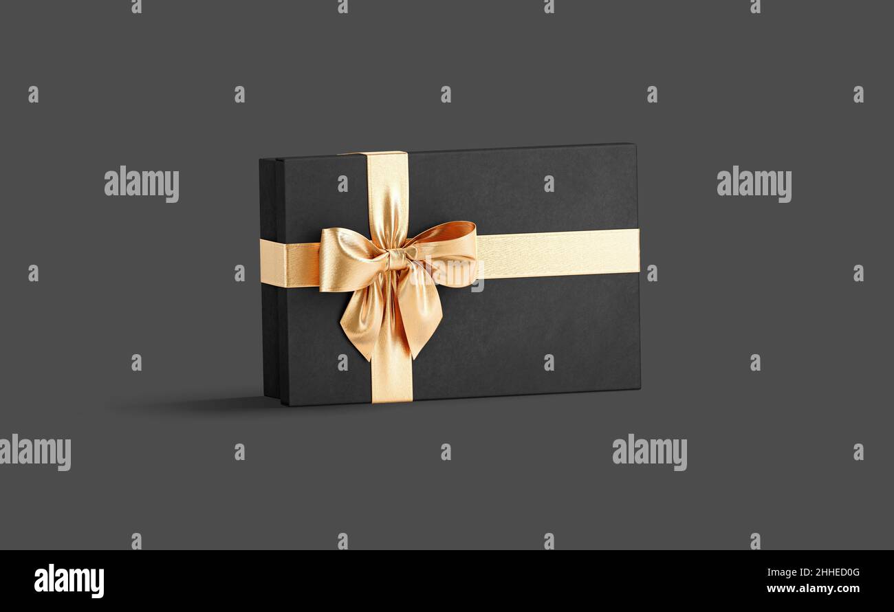 Blank black gift box with gold ribbon bow mockup Stock Photo - Alamy
