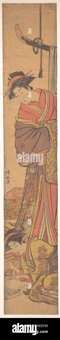 Young Woman Looking over Shoulder of Another who is Writing a Letter ...