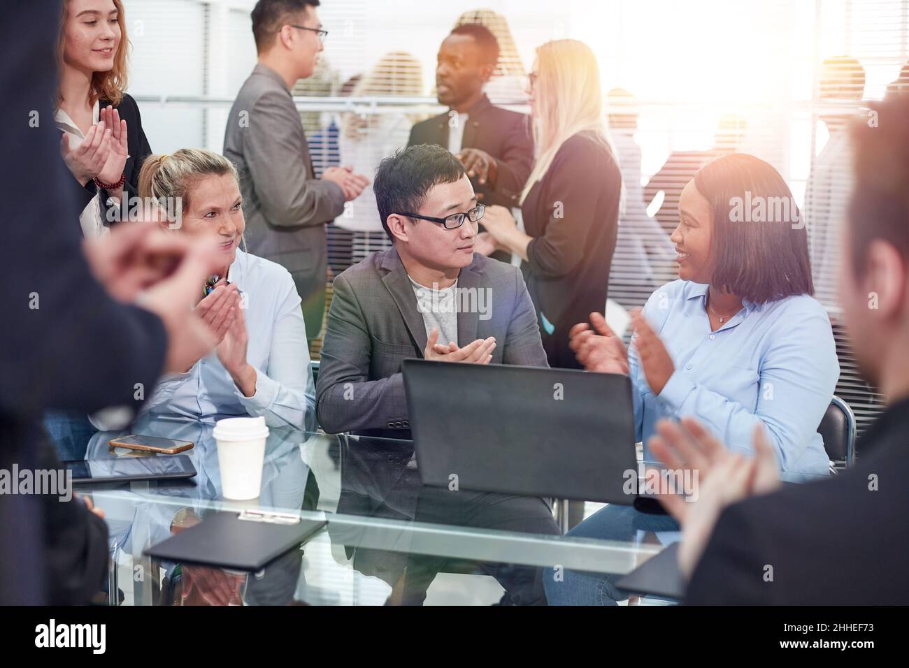 Business people working together on desktop computer Stock Photo - Alamy