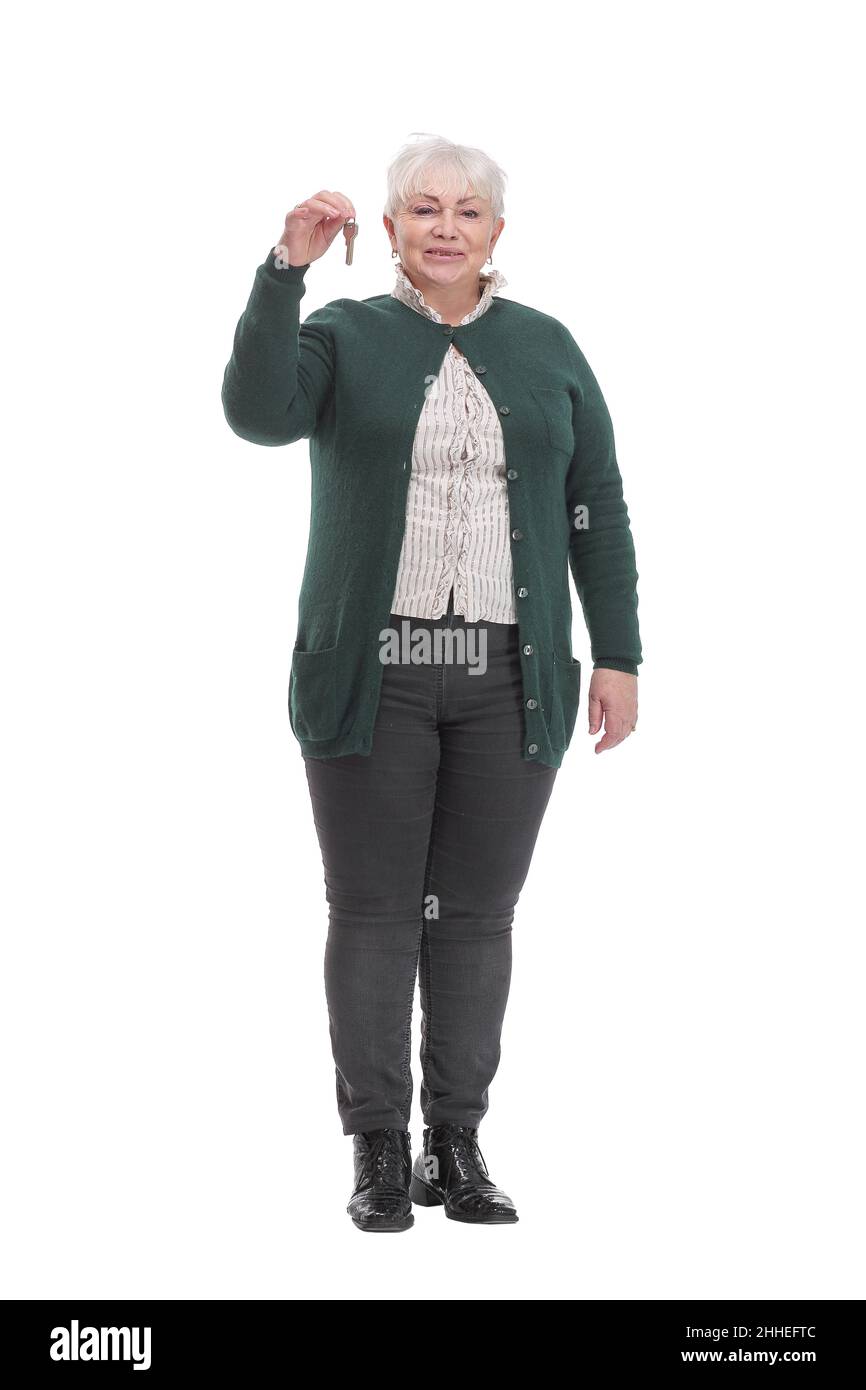Middle aged woman happy and smiling, holding the keys Stock Photo - Alamy