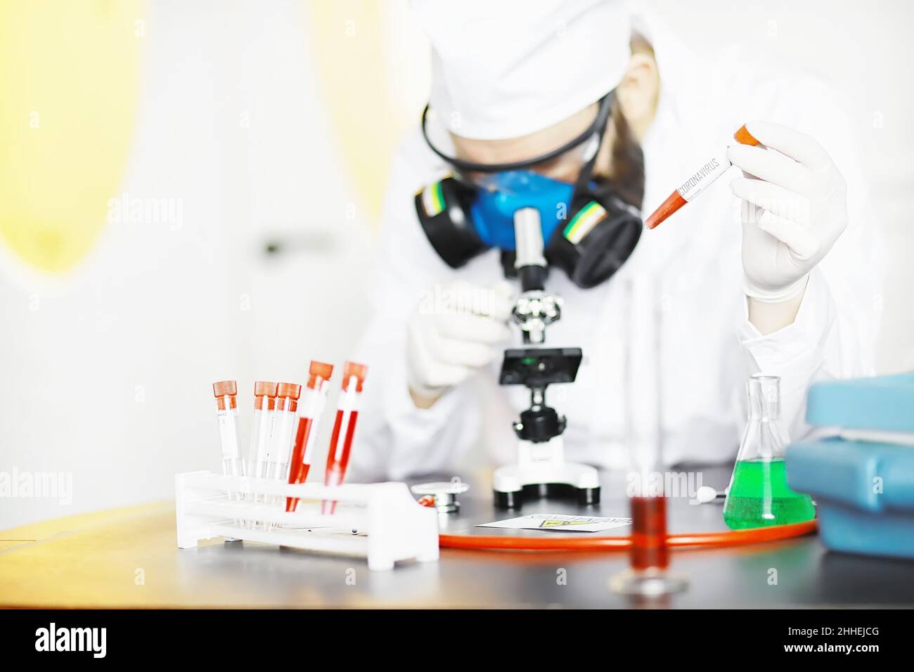 A scientist researcher in the laboratory is testing drugs for treatment ...