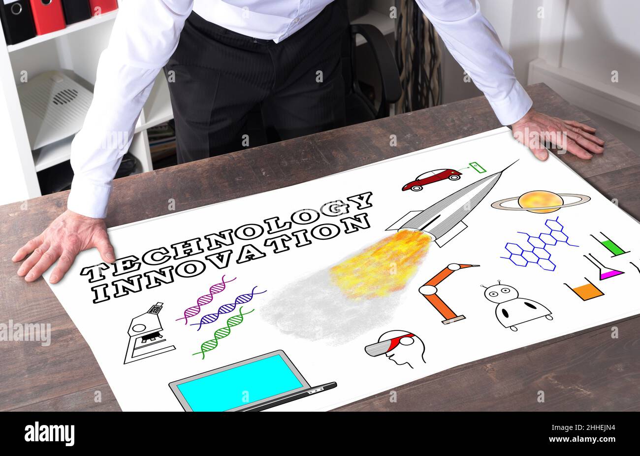 Man watching a concept of technology innovation placed on a desk Stock ...