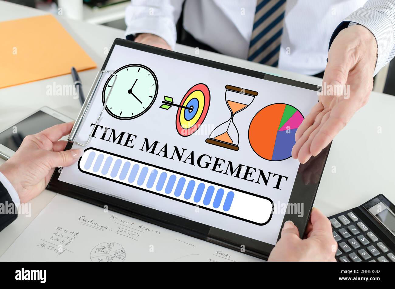 Time management concept shown by a businessman Stock Photo - Alamy