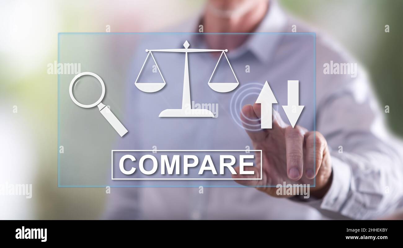 Man touching a compare concept on a touch screen with his finger Stock ...