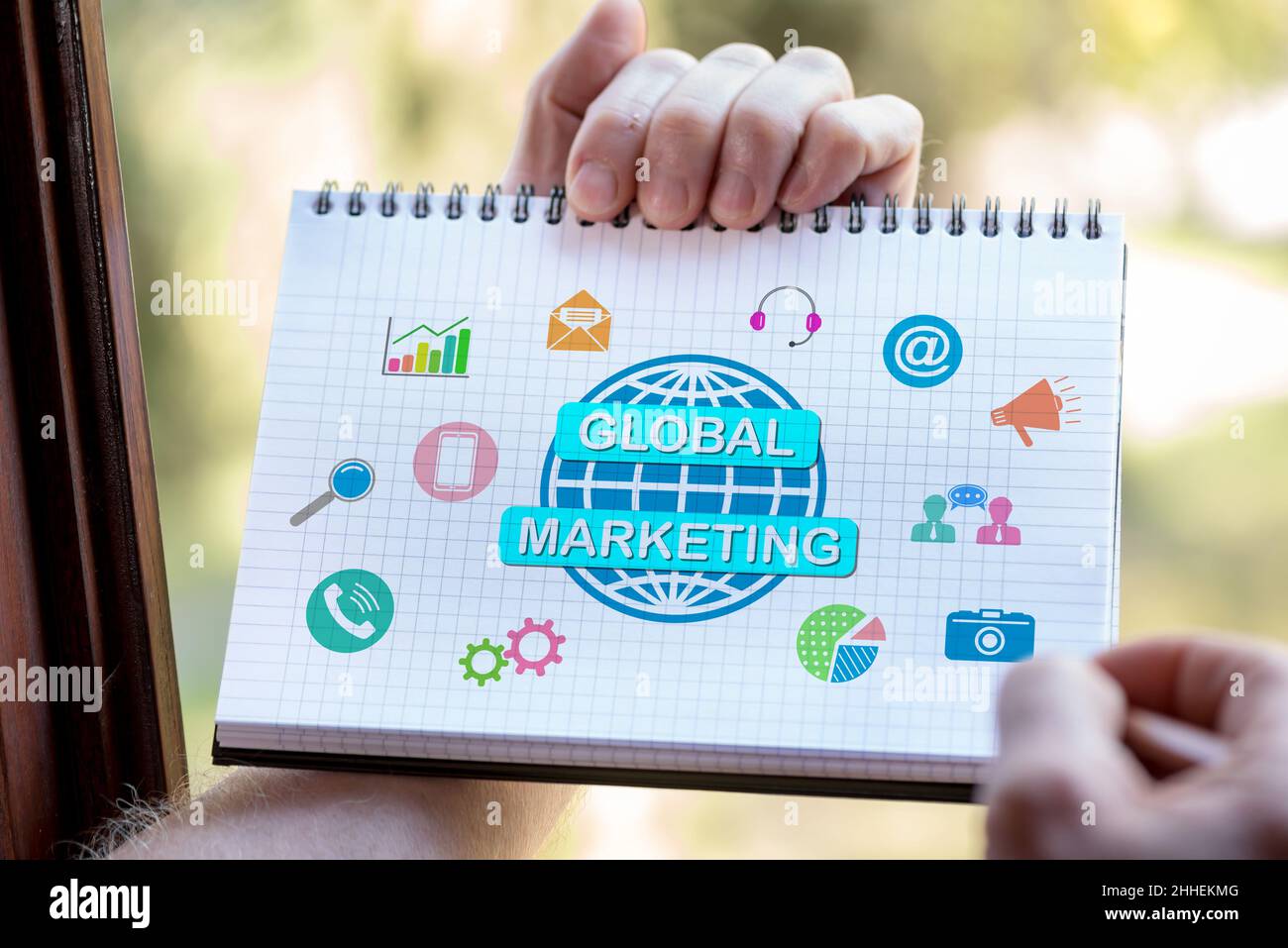 Hand drawing global marketing concept on a notepad Stock Photo - Alamy