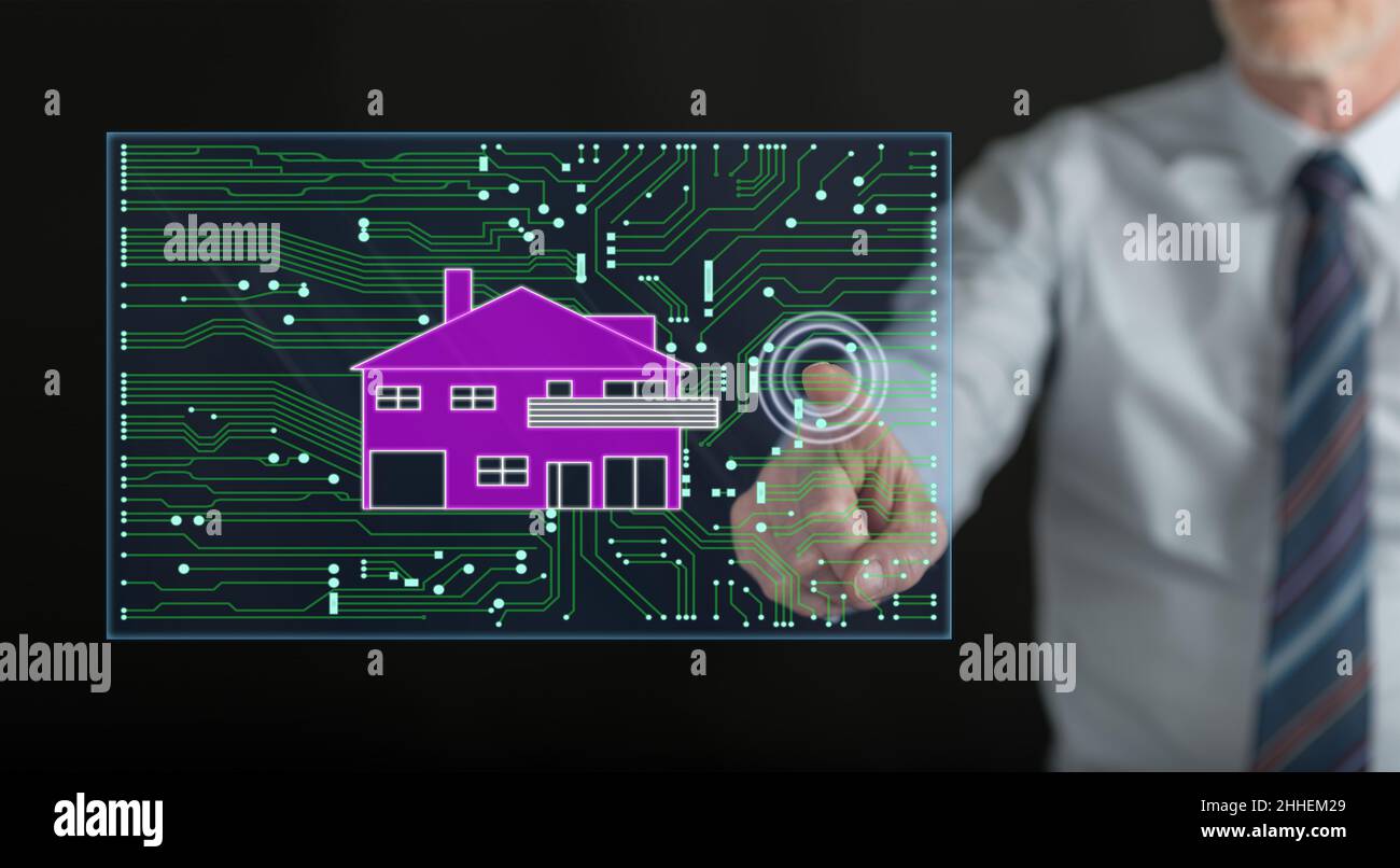 Man touching a digital smart home automation concept on a touch screen ...