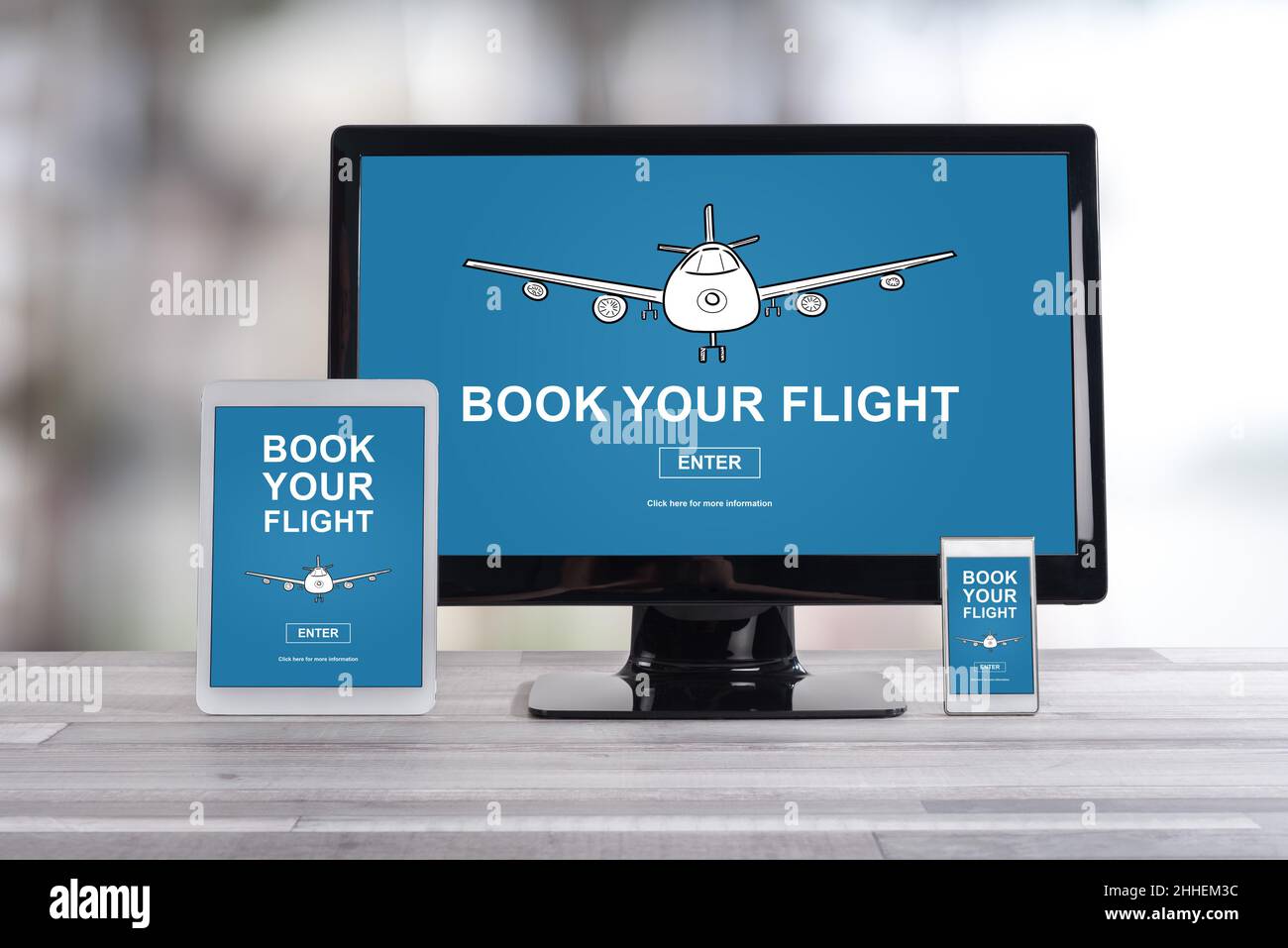 Flight booking concept shown on different information technology ...