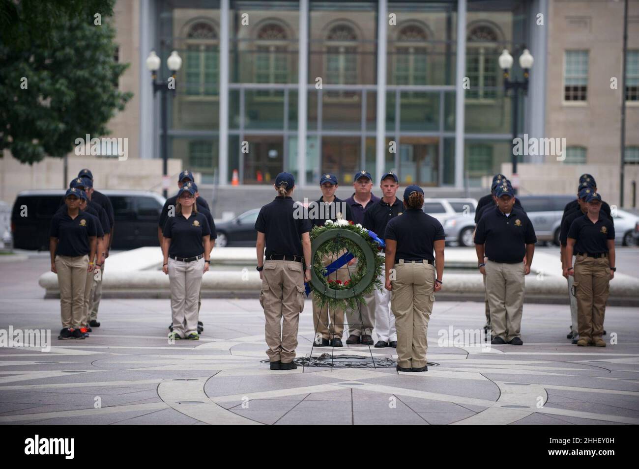 Standing at attention with wreath law enforcement explorers Stock Photo ...