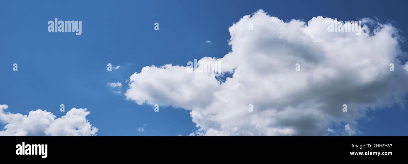 White cumulus clouds in blue sky, beautiful cloudscape background, long ...