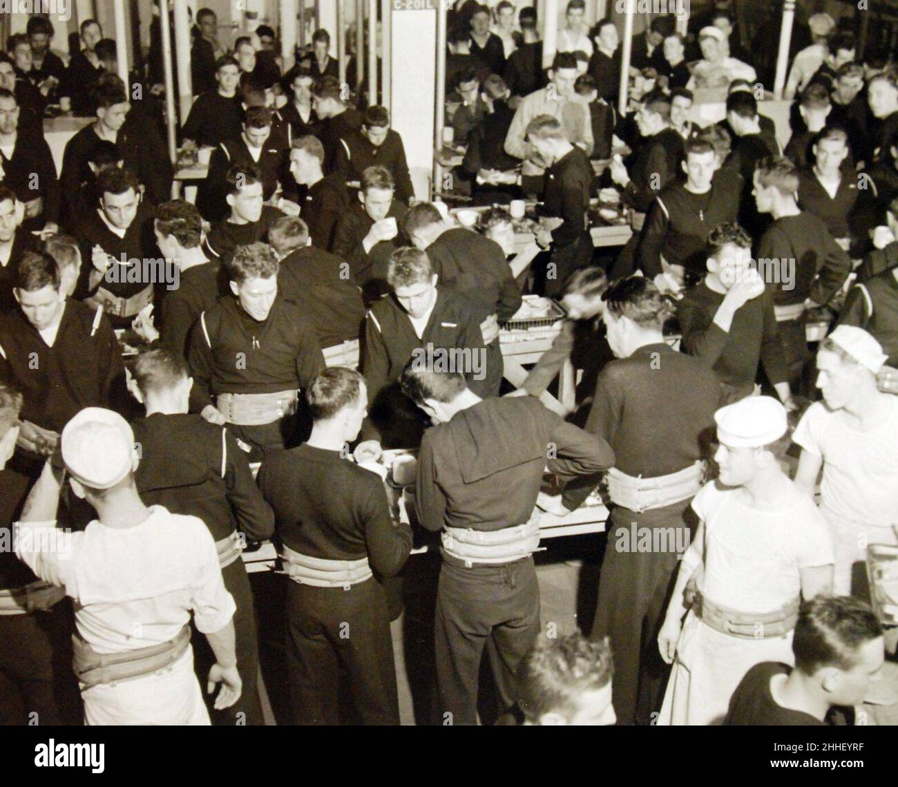Standing room only in the mess hall aboard a transport ship ...
