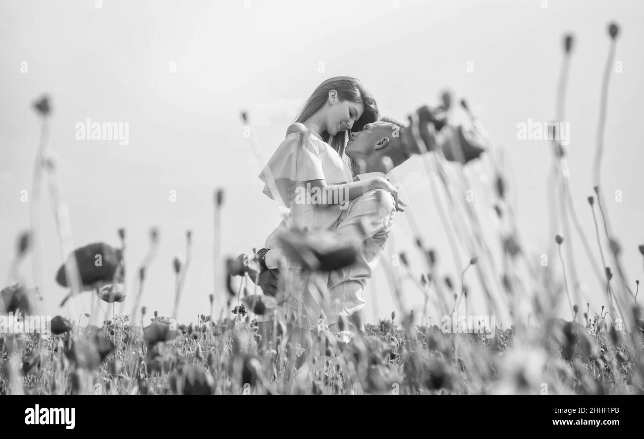 Man woman red poppy Black and White Stock Photos & Images - Alamy