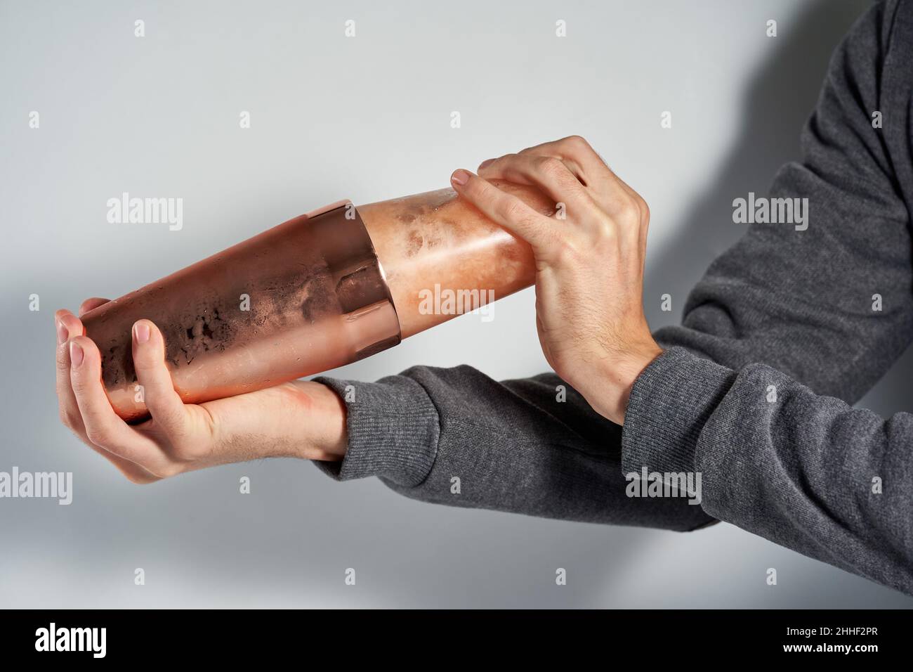 Hands holding cocktail shaker hi-res stock photography and images - Alamy