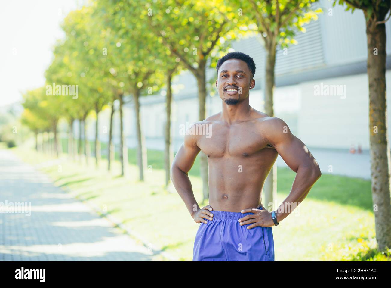 Portrait of a male athlete looking into the camera motivates the coach ...