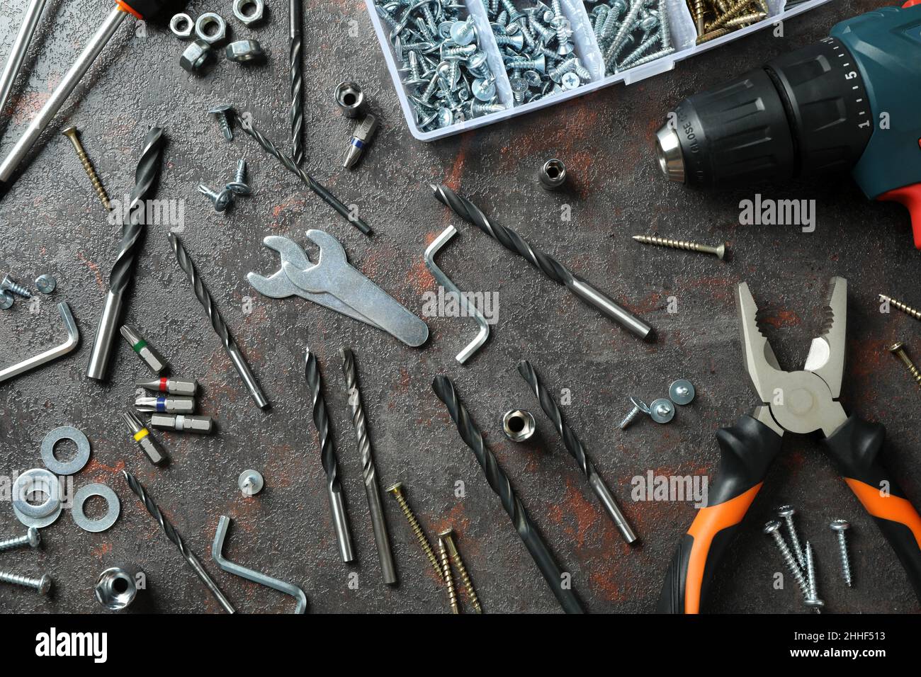 Work tools on dark textured background, top view Stock Photo - Alamy