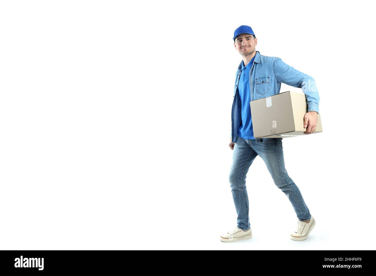 Delivery man walking with a box, isolated on white background Stock ...