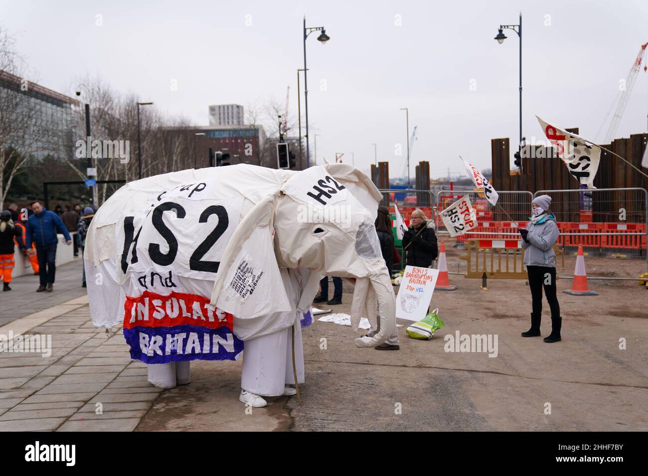 Environmental activists dressed as a white elephant protest outside the ...