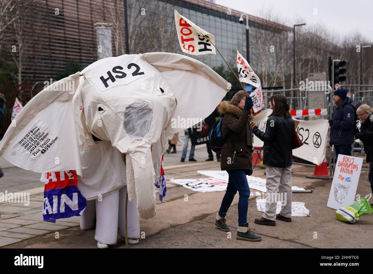 Environmental activists dressed as a white elephant protest outside the ...