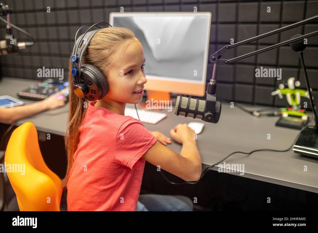 Teen speaking into microphone hi-res stock photography and images - Alamy