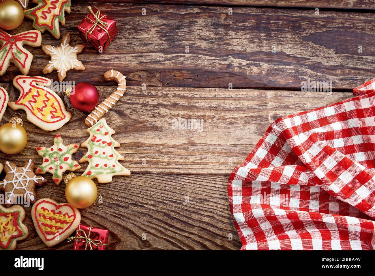 Christmas banner. Plaid tablecloth and Xmas cookies. Copy space, mock ...
