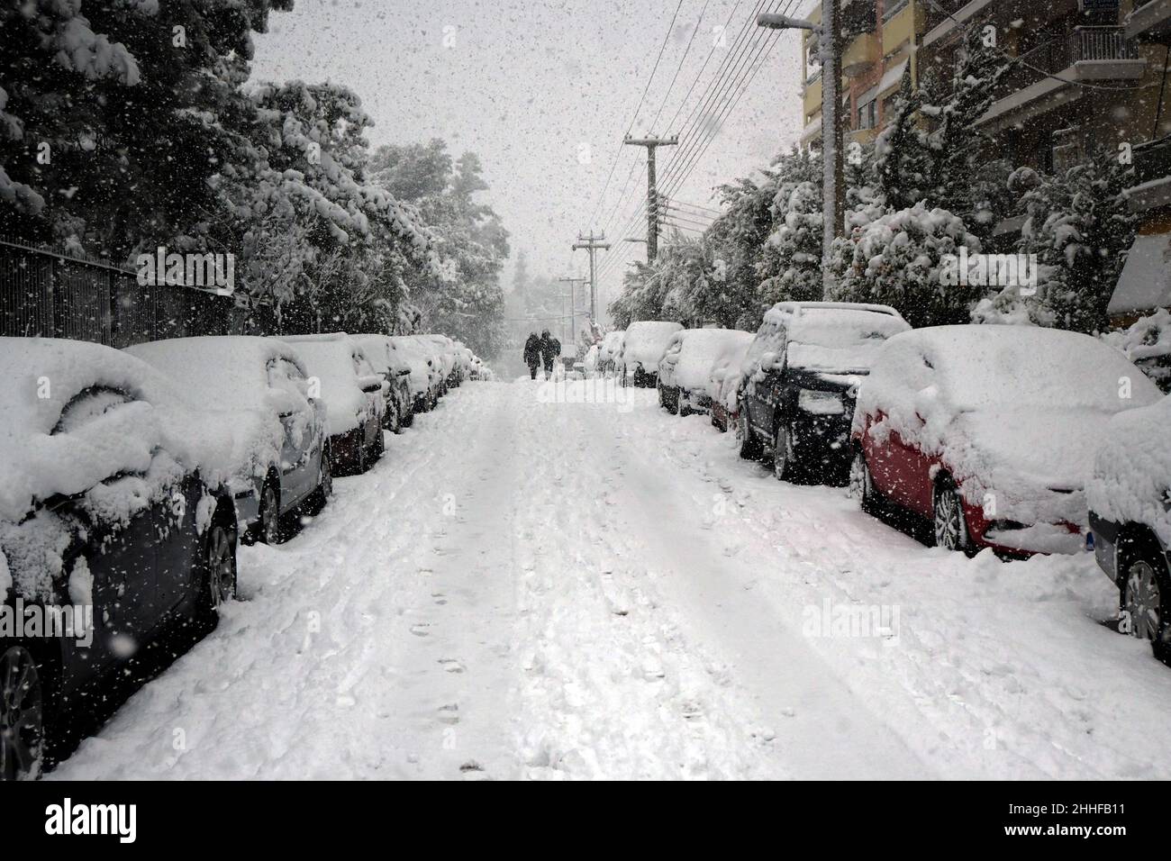 Athens, Greece. 24th Jan., 2022. People walk amidst snowfall in Athens ...