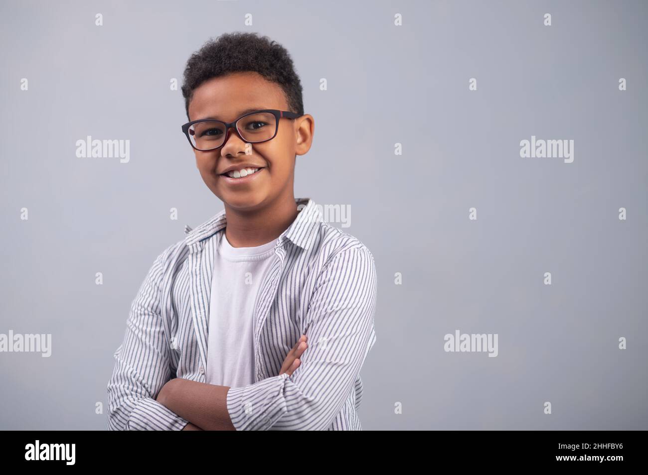 Boy wearing a shirt standing hi-res stock photography and images - Alamy