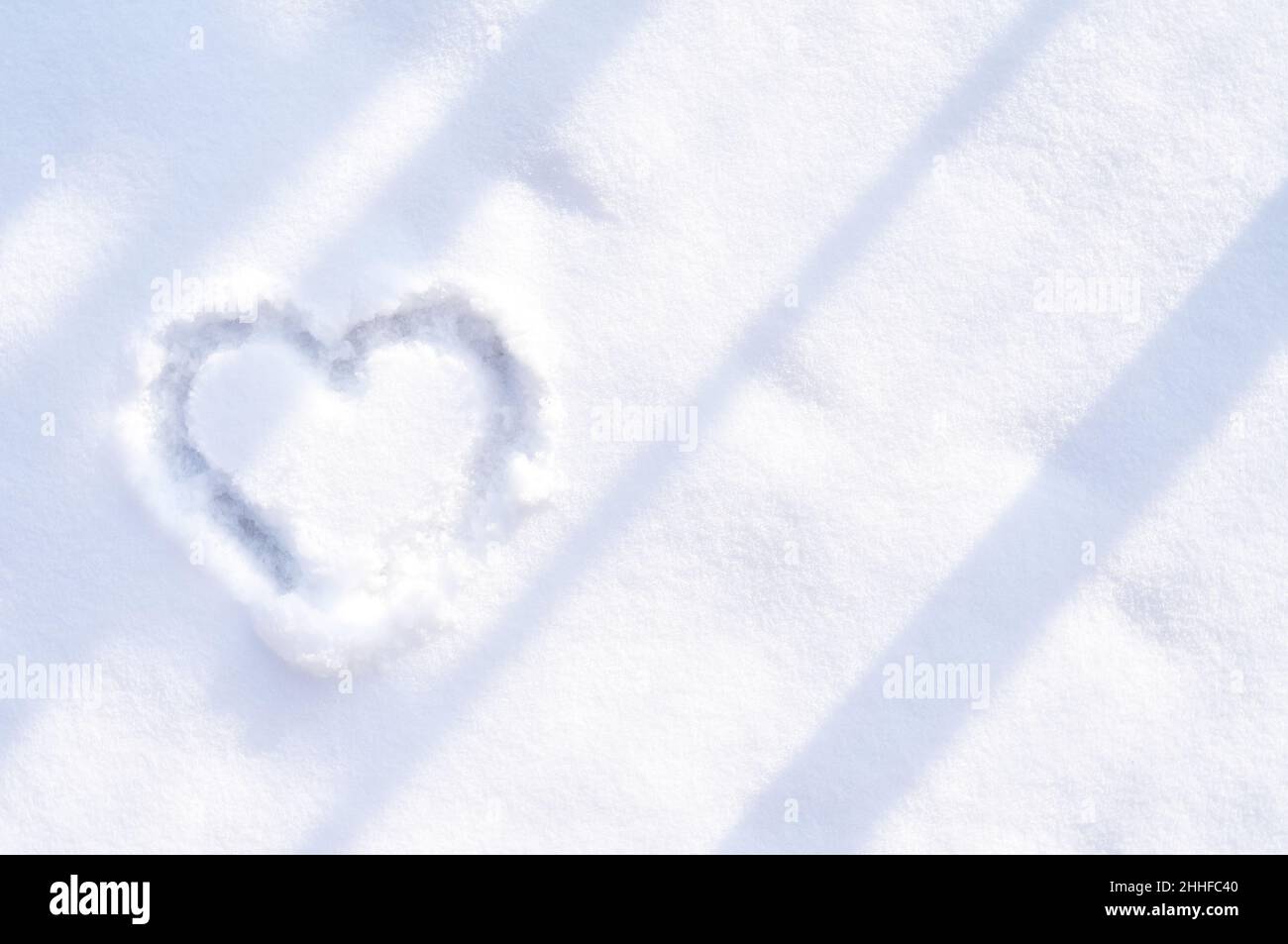 Heart shape painted on snow hi-res stock photography and images - Alamy