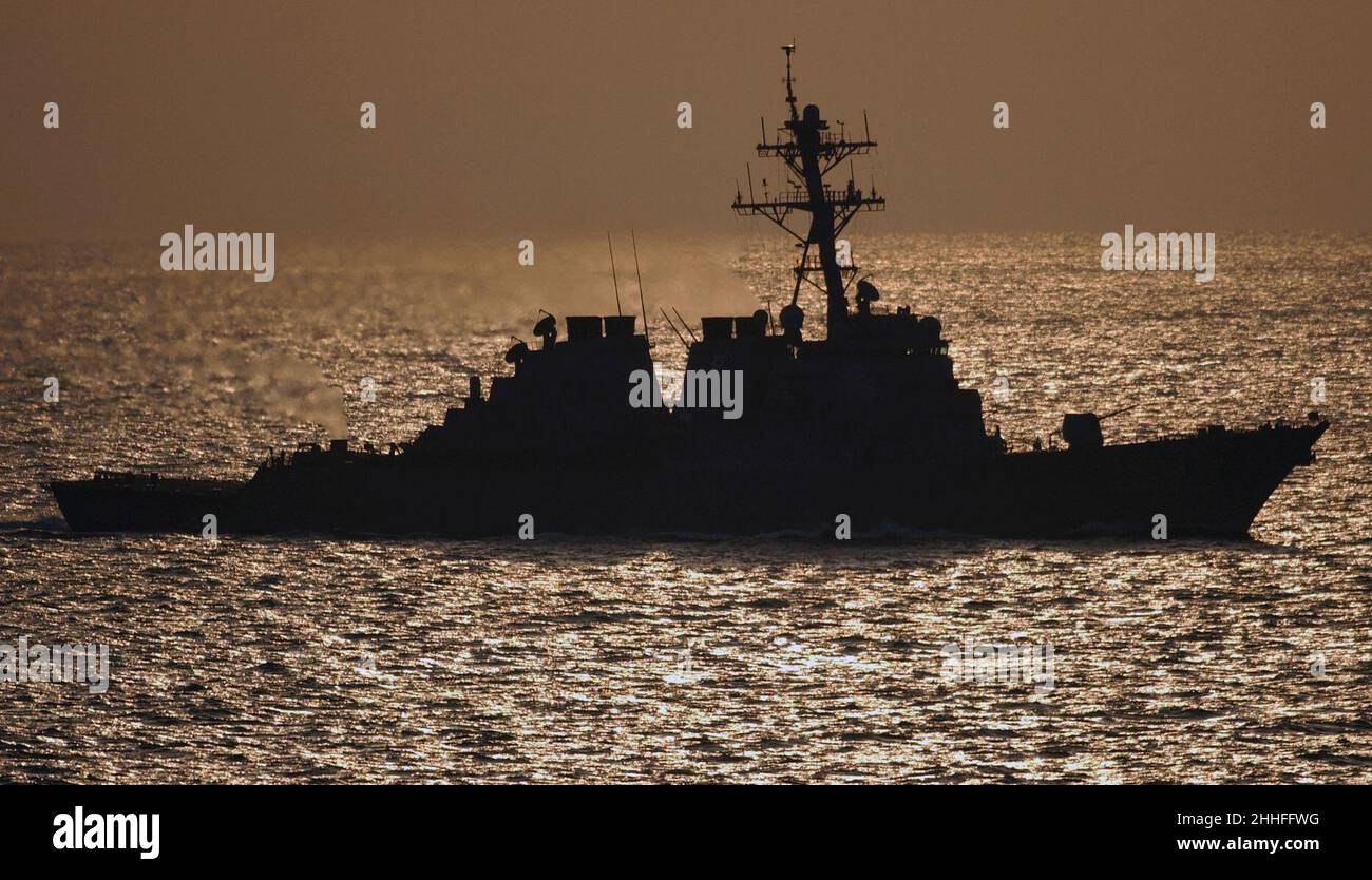 Starboard beam view of USS Donald Cook (DDG-75) steaming behind USS ...