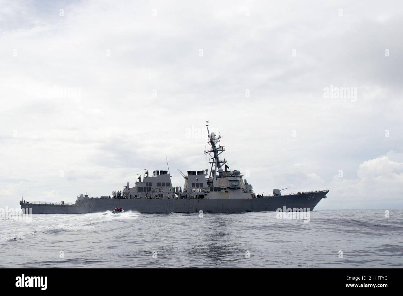 Starboard side view of USS Curtis Wilbur (DDG-54) with simulated small ...