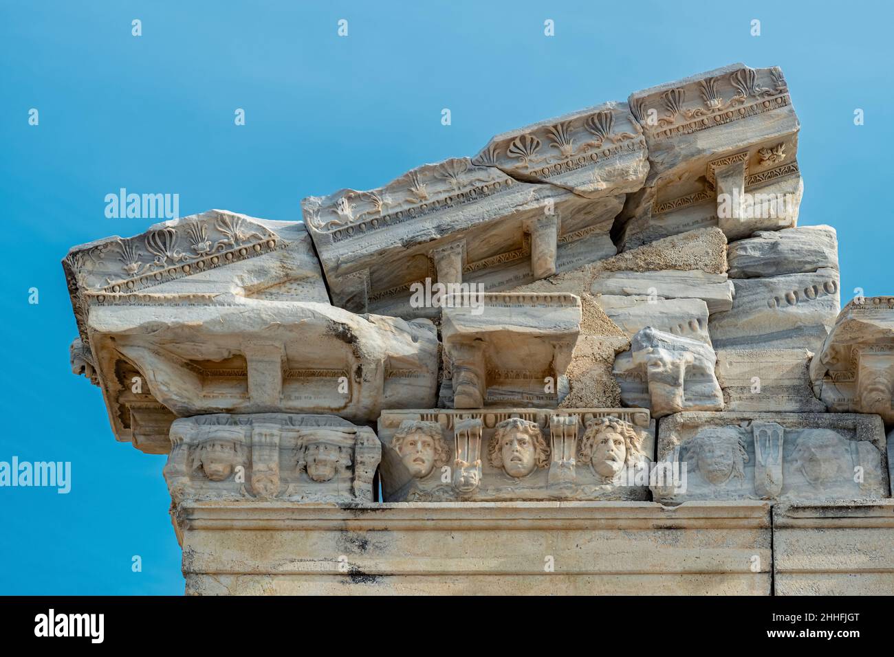 fragment of the entablature of the ruined temple of Apollo in Side with ...