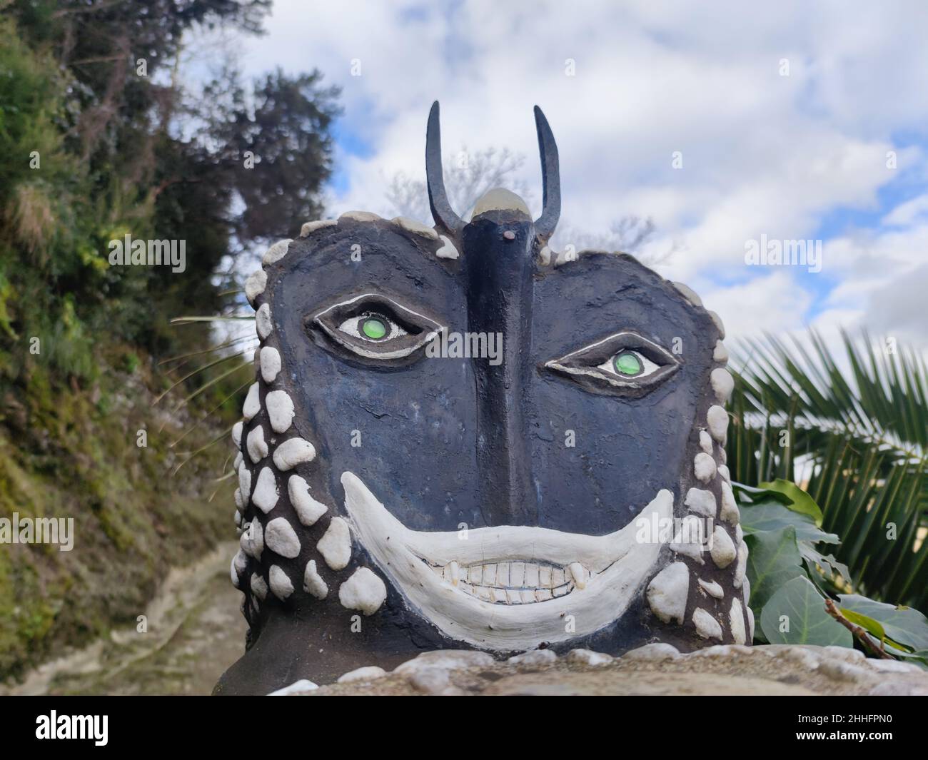 Tribal mask human face painted shovel working spade detail Stock Photo ...