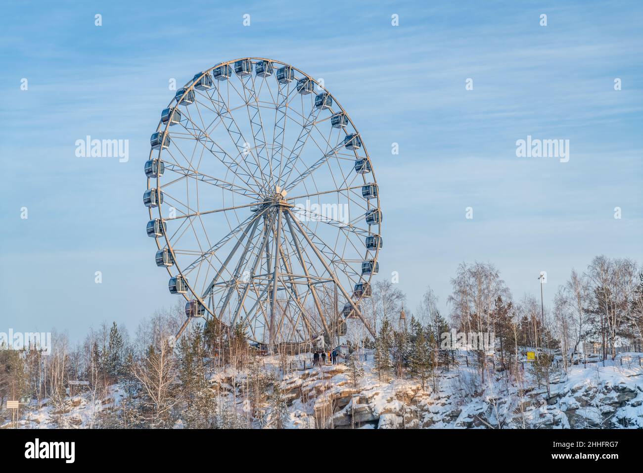 Ferris wheel in the snow-covered park in winter Stock Photo - Alamy