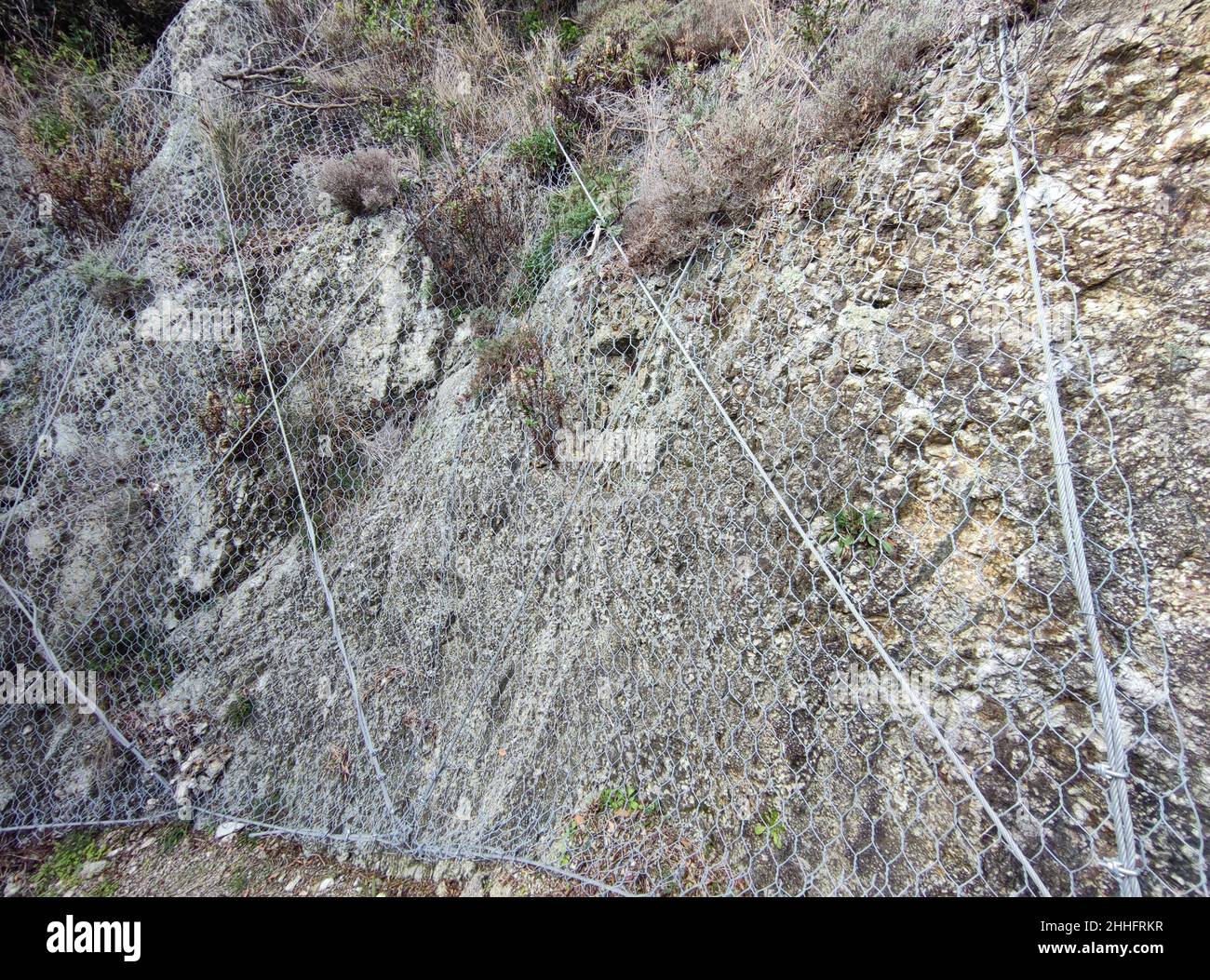 Steel net at slope hill for road protection hi-res stock photography ...