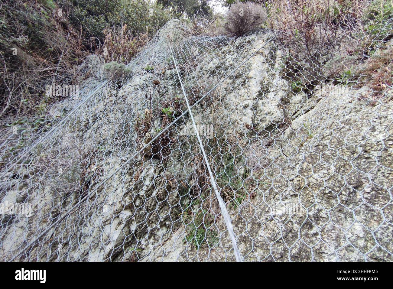 Steel net at slope hill for road protection hi-res stock photography ...