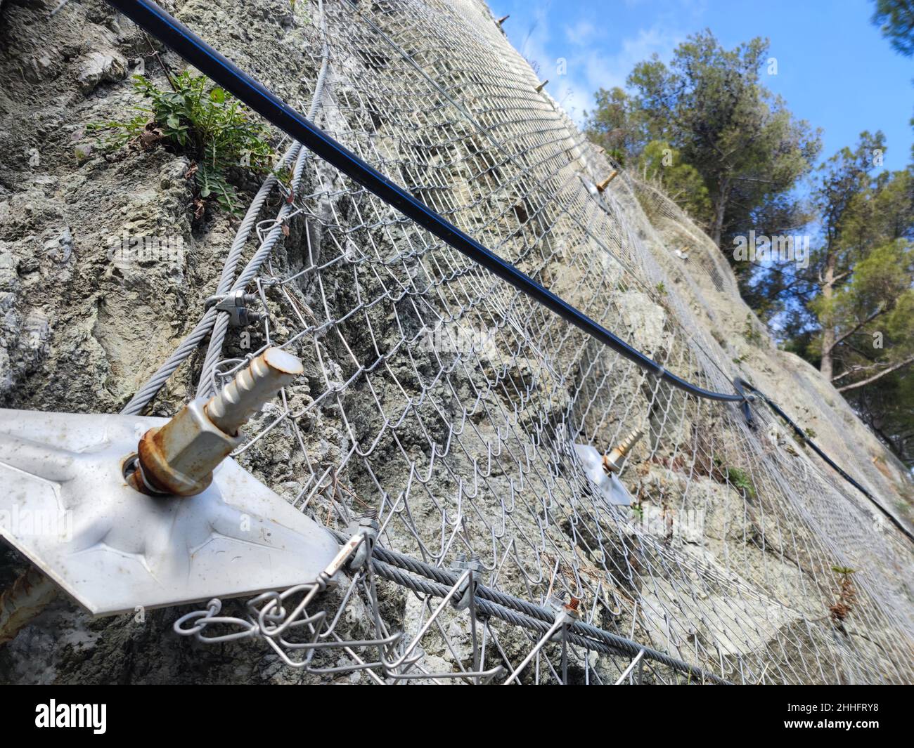 Steel net at slope hill for road protection hi-res stock photography ...