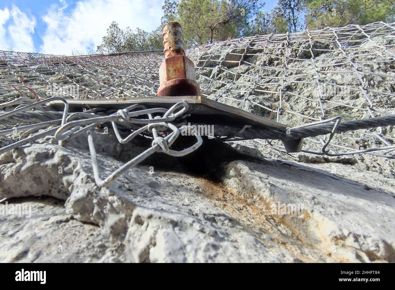 Steel net at slope hill for road protection hi-res stock photography ...