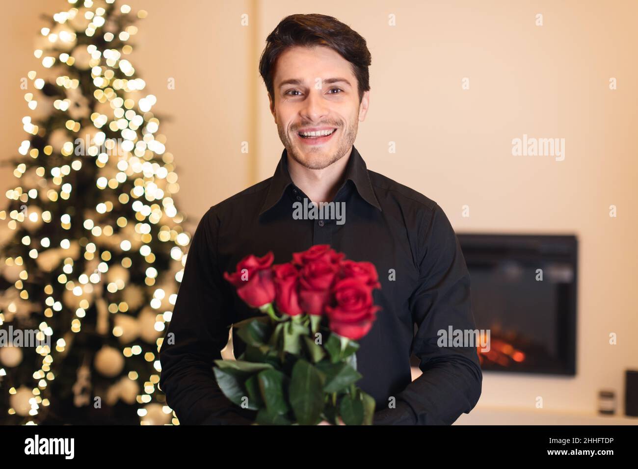 Man holding rose bouquet hi-res stock photography and images - Alamy